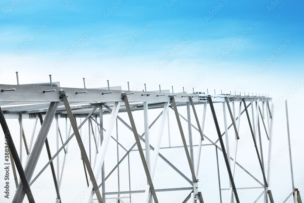 High voltage tower construction outdoors. Installation of electrical ...