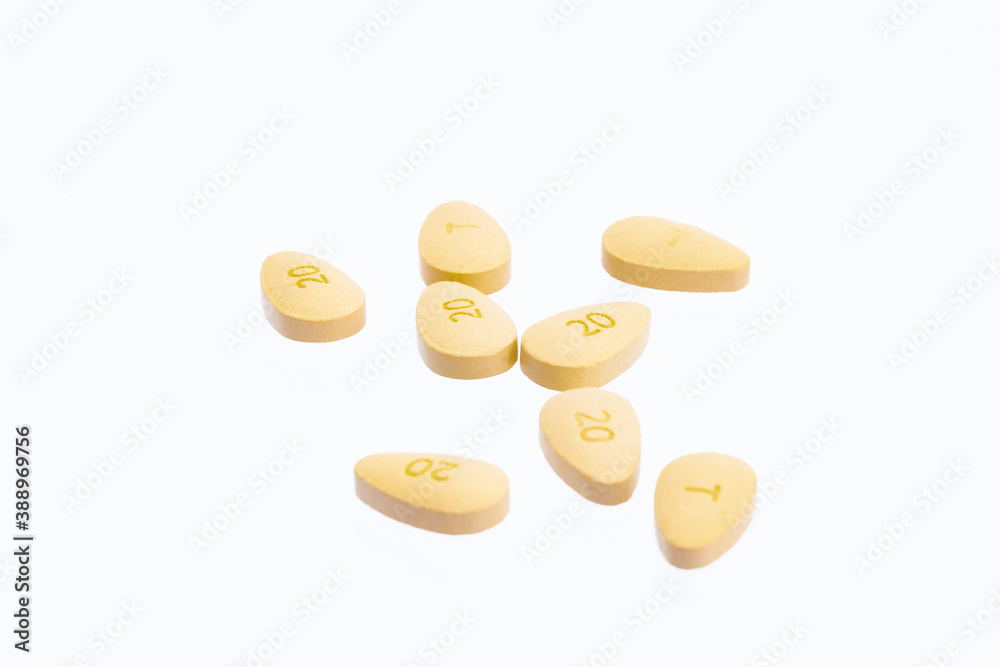 Brown pills pills isolated on white background Stock Photo | Adobe Stock