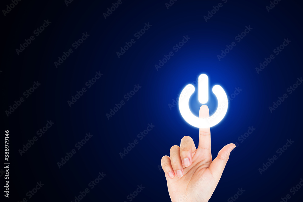 Ecology and Power Saving Concept : Finger press on electrical power ...