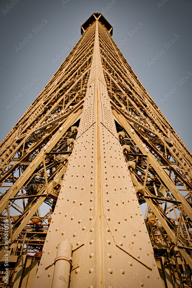 Detail of the iron structure of the Eiffel Tower with thousands of riv ...