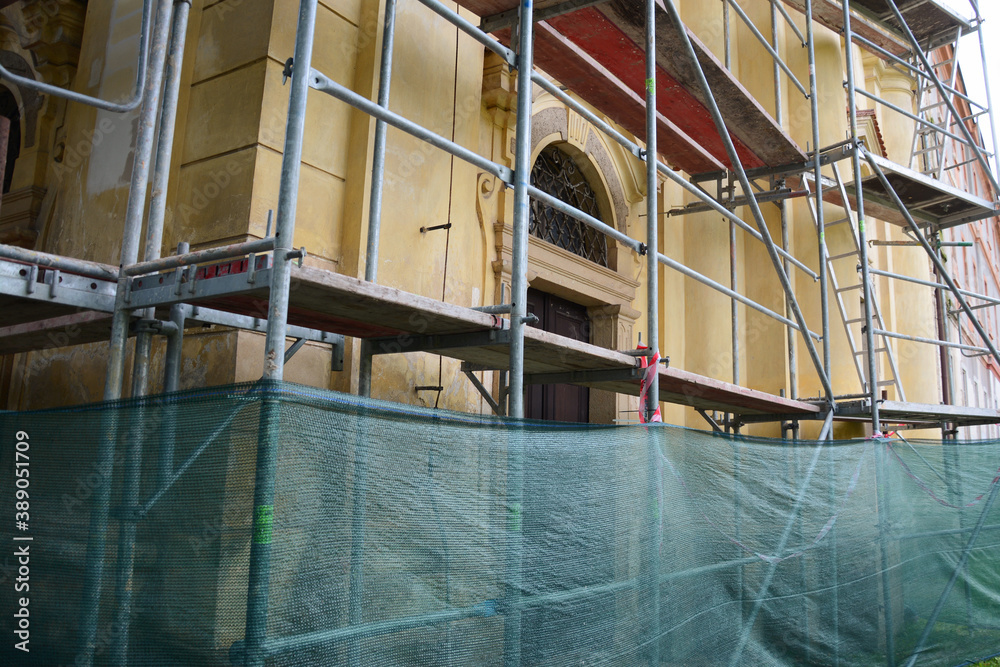 Church scaffolding. Restoring old monastery. Scaffolding construction ...