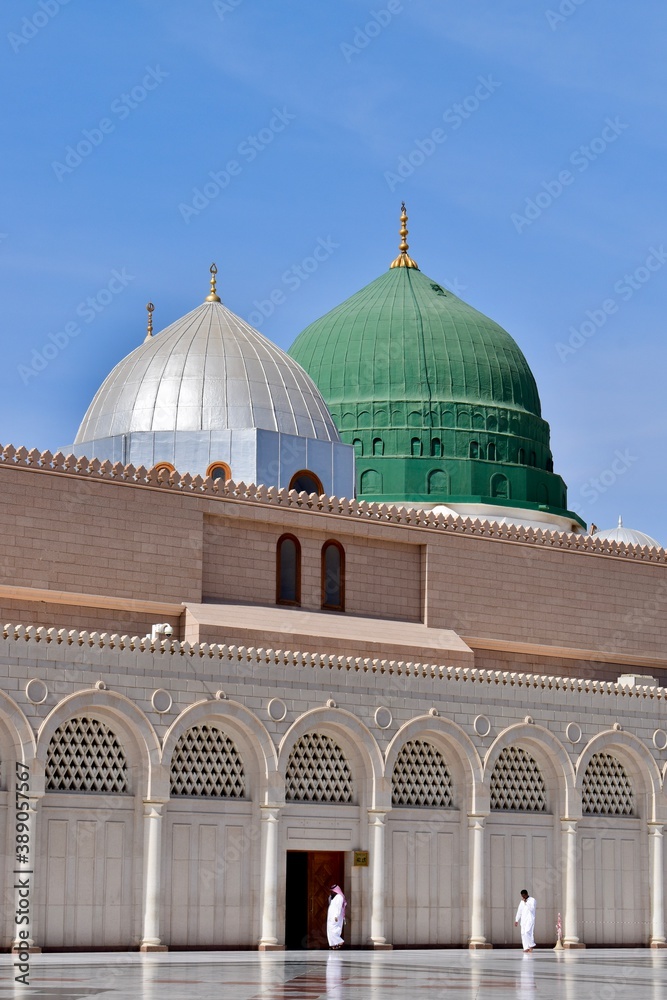 Green and white domes of the mosque Al-Masjid an-Nabawi, Medina, Saudi ...
