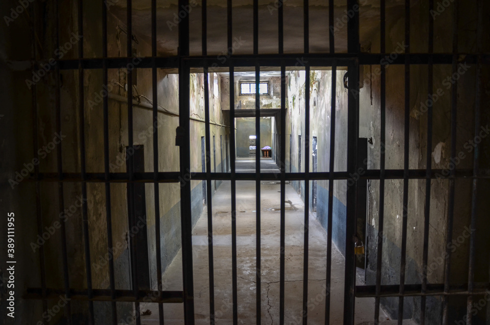 Metal bars in jail. Medieval prison with iron bars. Security grids in ...