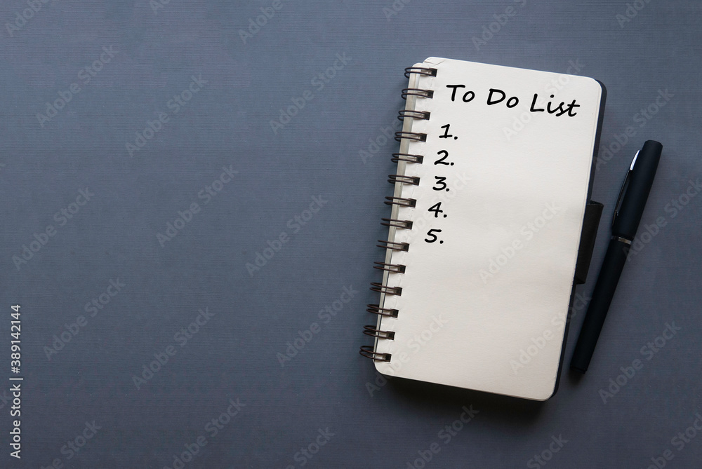 Top view of pen and notebook written with To Do List and its numbering ...