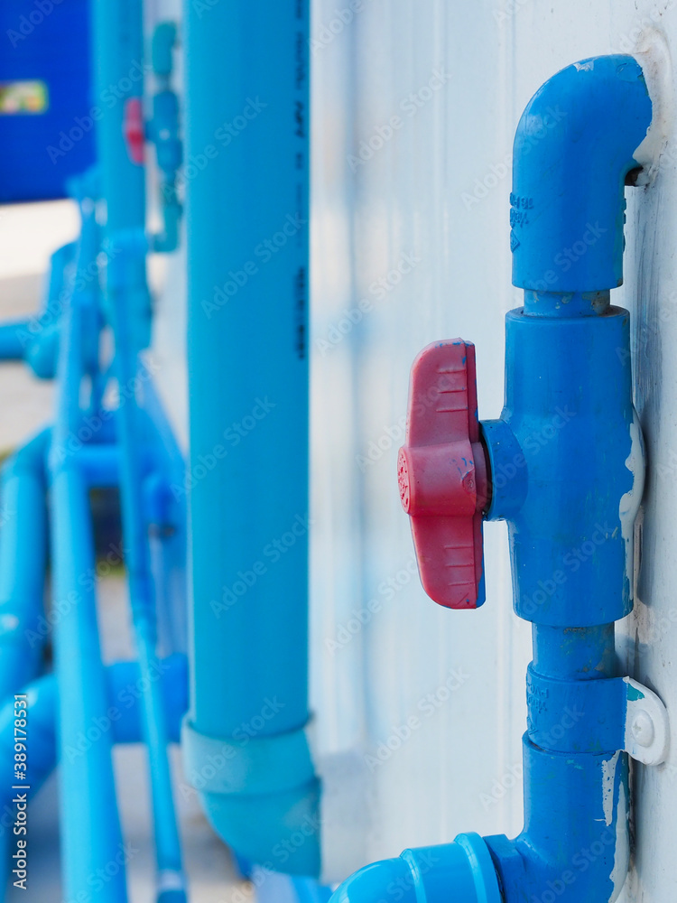 A 2-way PVC sanitary ball valve installed at the back of a portable ...