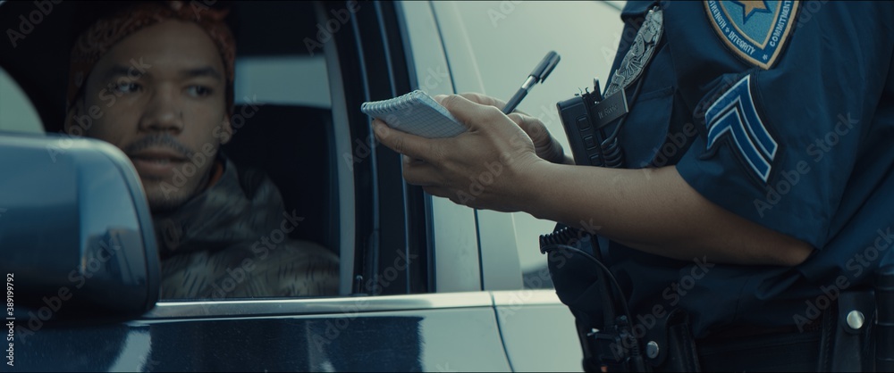 African-American black driver is being pulled off by mixed-race female ...