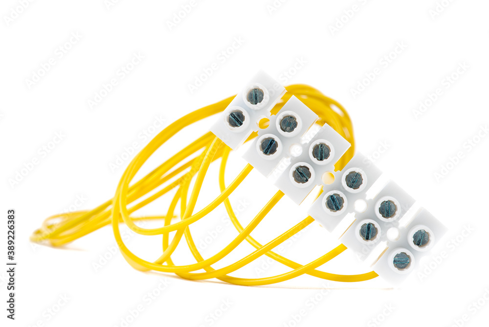 Electrical cable connected to terminal block isolated on white ...
