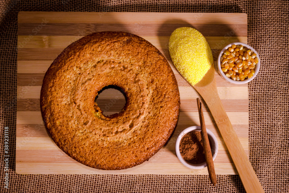 Brazilian corn cake made with a type of corn flour (Fuba) on the wood ...