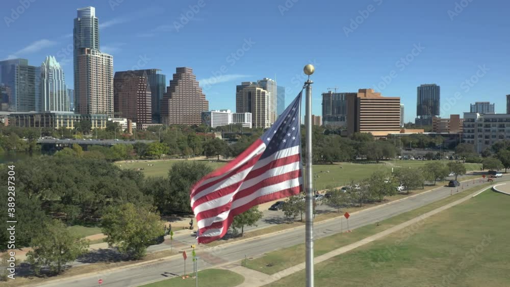 American Flag waving in front of the Austin Texas skyline Stock Video ...