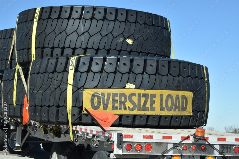 Oversize Load of Tires Stock Photo | Adobe Stock