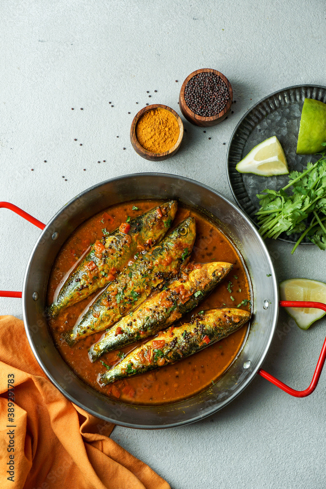 indian style fish curry, sardine with black mustard sauсe Stock Photo ...