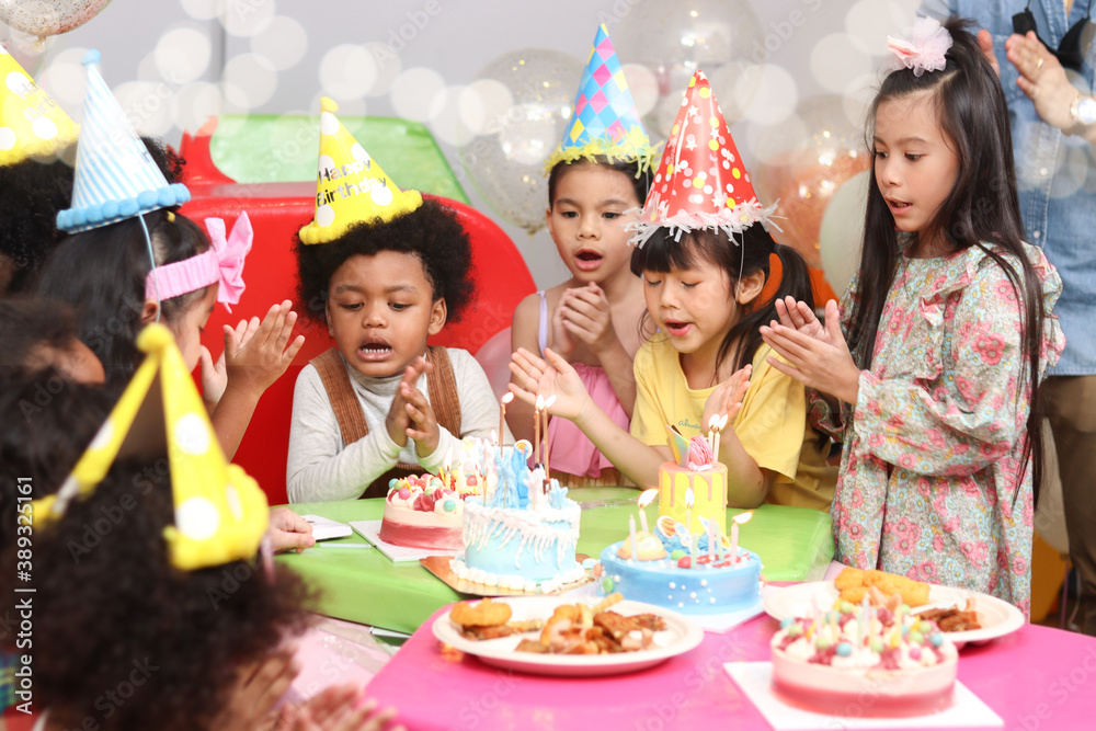 Happy birthday party event, group of adorable kids celebrate birthday ...