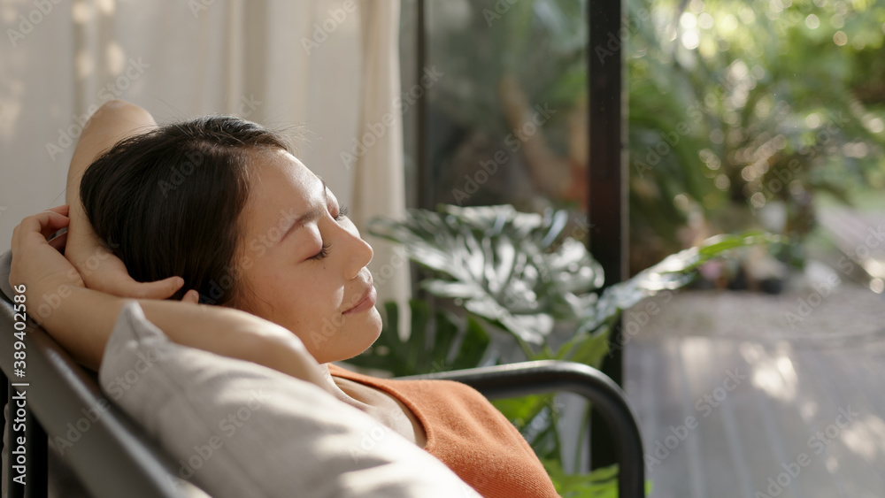 Asian woman resting breathing fresh air feeling mental balance enjoying ...