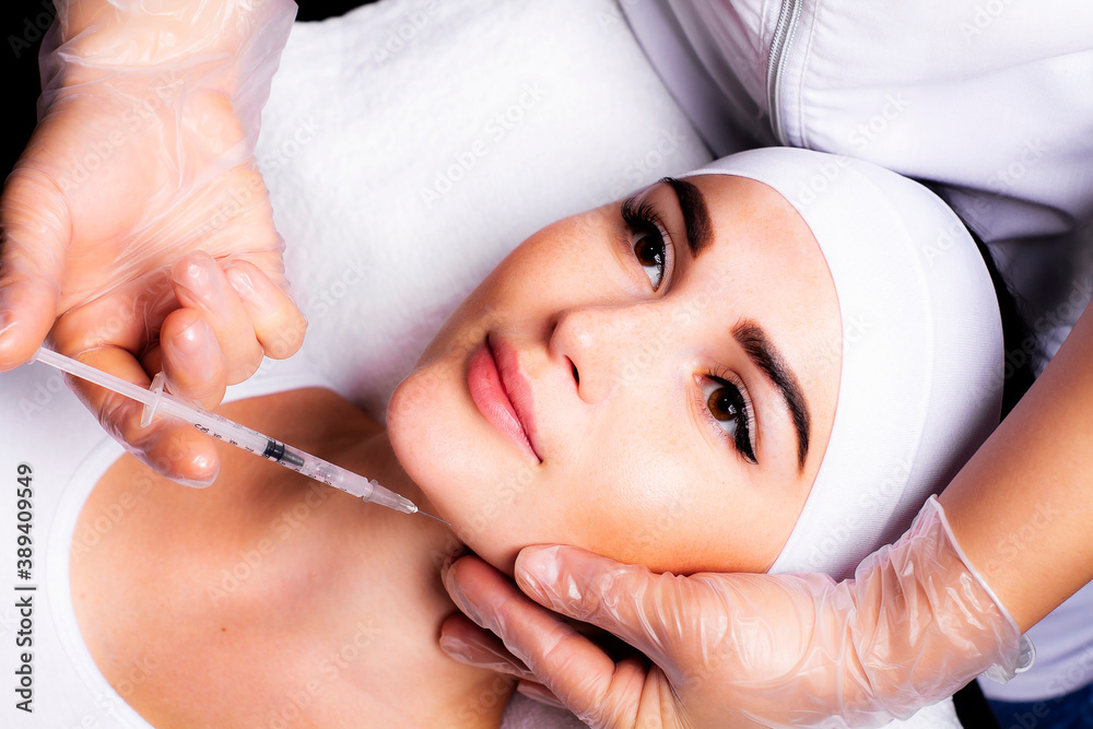 The corners of the lower jaw contour plastic. Injection chin correction ...