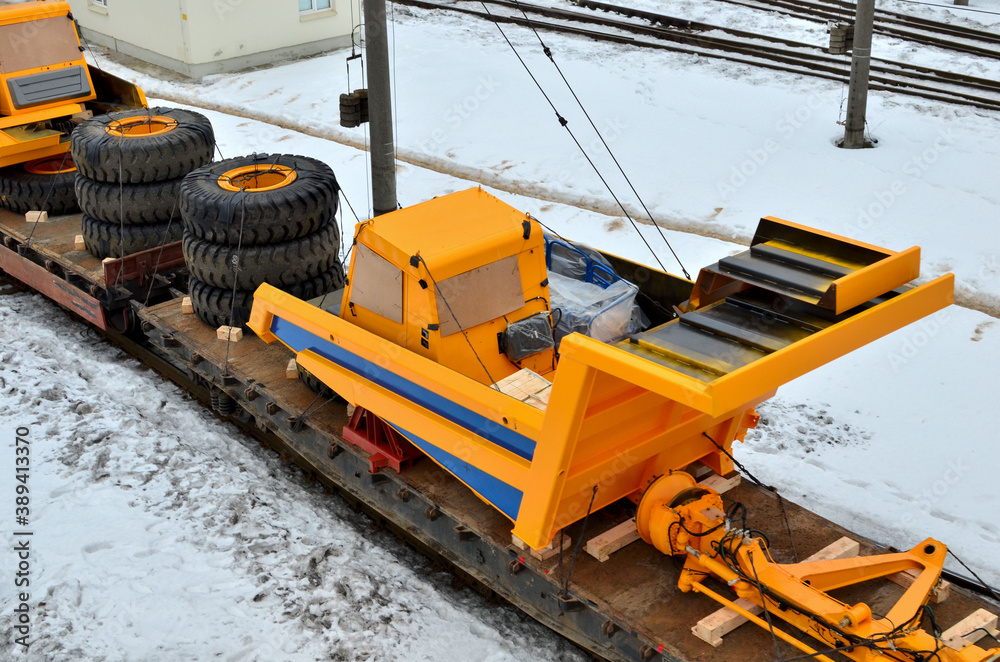 Yellow mining truck disassembled into parts, cab, body, electric motor ...