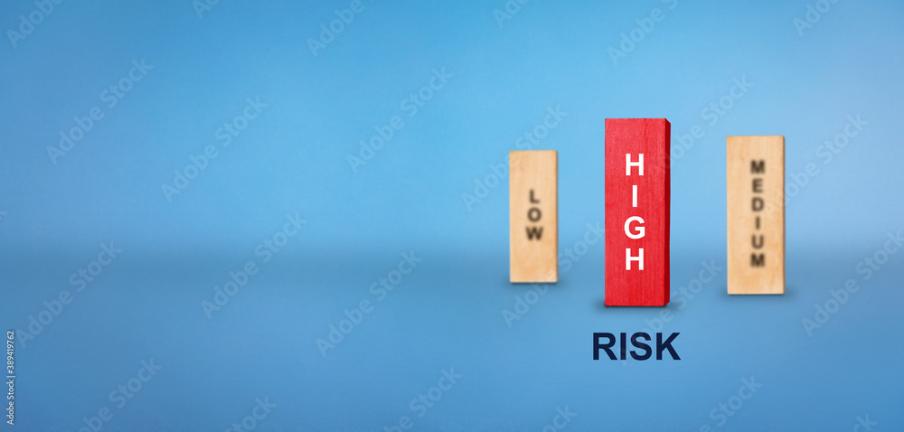 Red wooden block with text High Risk. Risk concept with text high ...