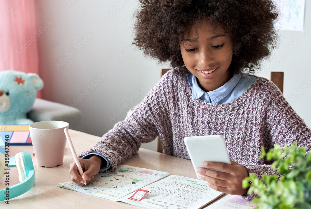 African american child kid school girl holding phone distance learning ...