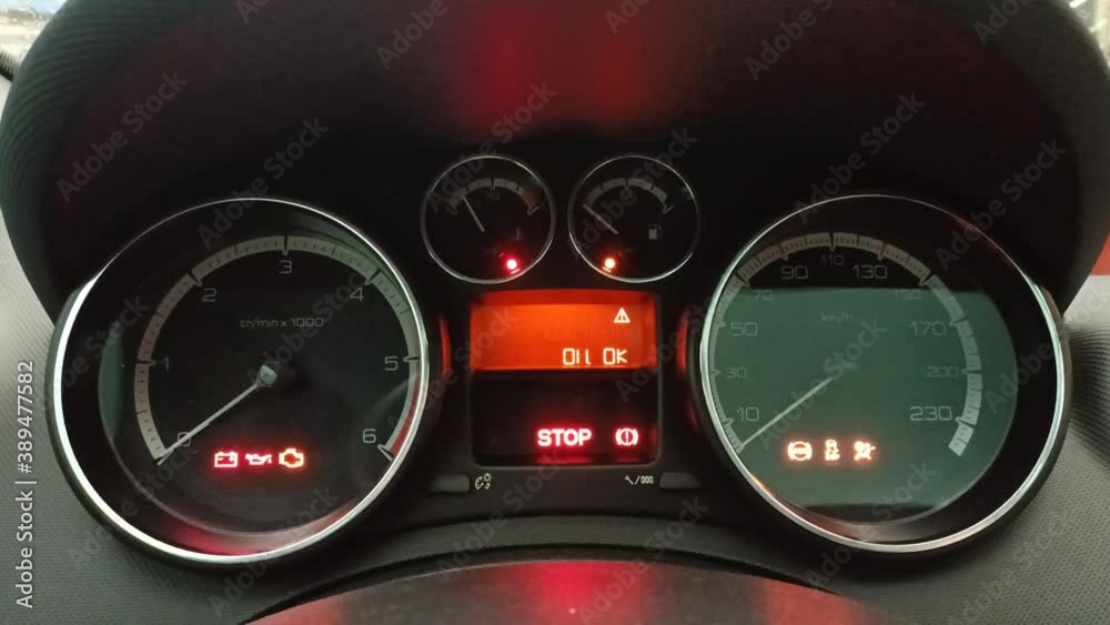 Handheld Shot Car Warning Light Symbols and Indicators on Car Dashboard ...