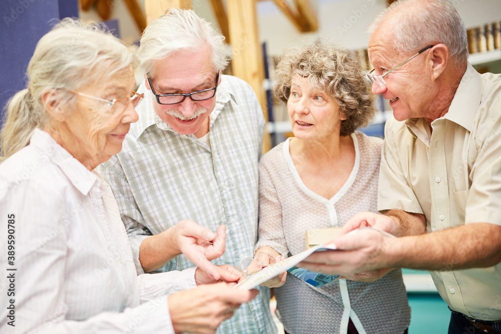 Senior group enjoys reading and learning Stock Photo | Adobe Stock
