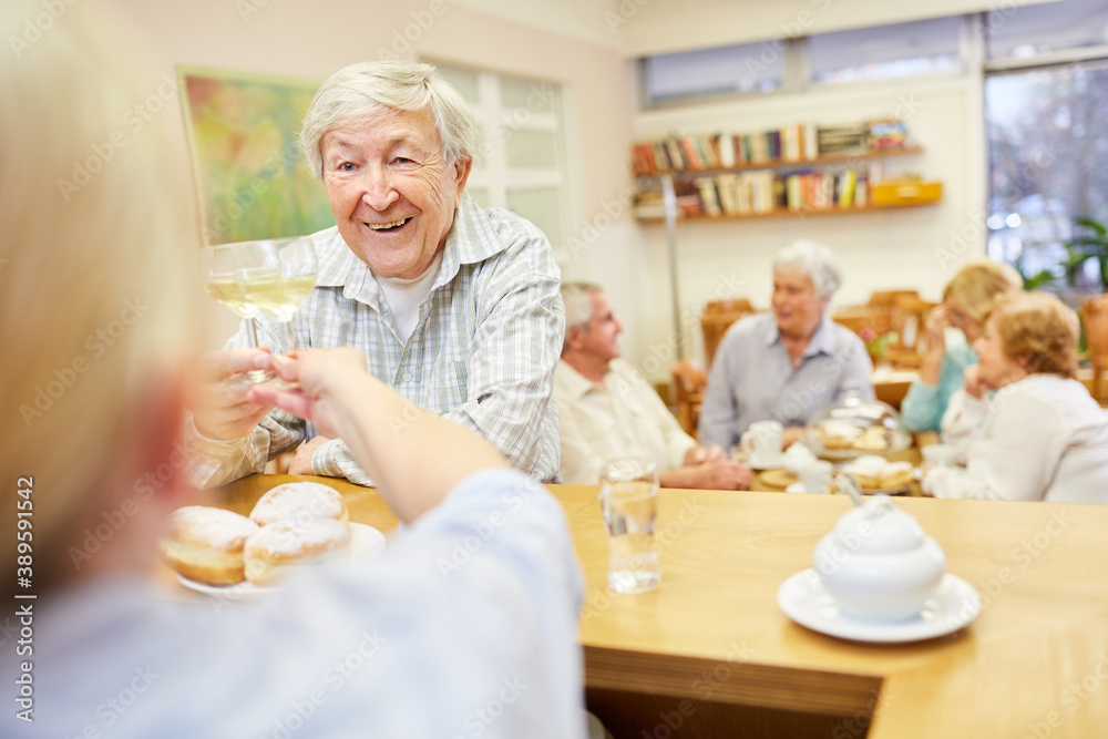 Old man drinks a glass of wine with a supervisor Stock Photo | Adobe Stock