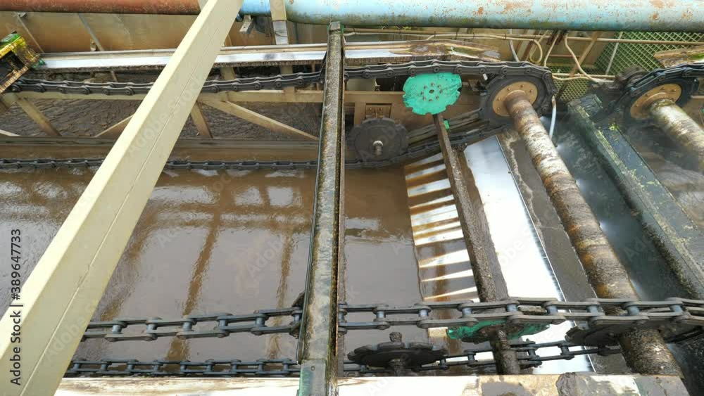 Chain foam and garbage collector. Blade remove floating waste and ...