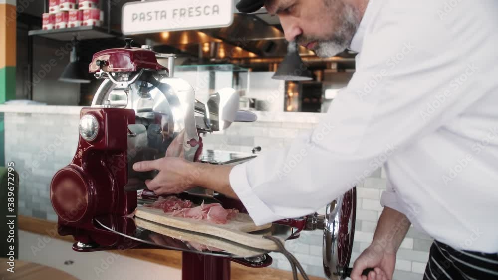 Traditional spanish and italian food, professional slicer for slicing ...