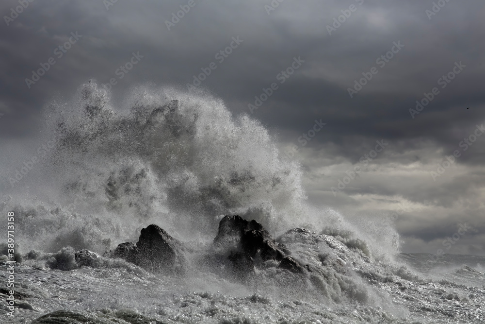 Wave splash and flooded cliffs Stock Photo | Adobe Stock