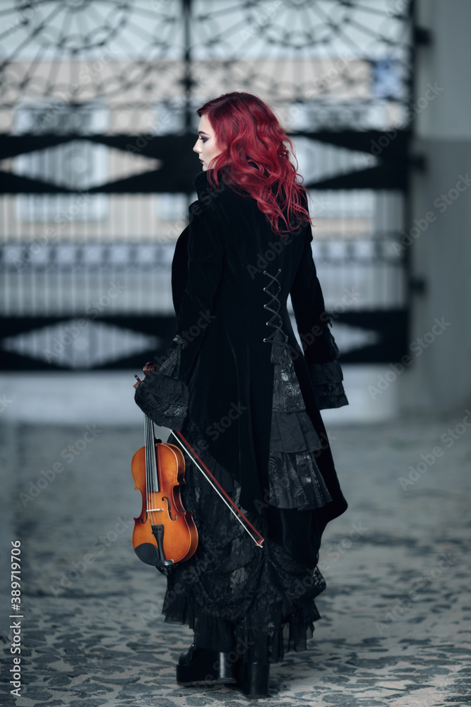 red haired vampire girl the violin in an old Museum in Gothic black ...