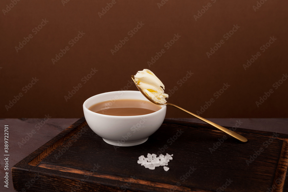 Traditional Tibetan butter tea or churned tea. Asian drink known as "Po ...