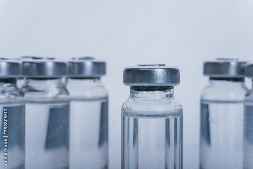 Glass medical ampoule vial for injection. Medicine is dry white drug ...