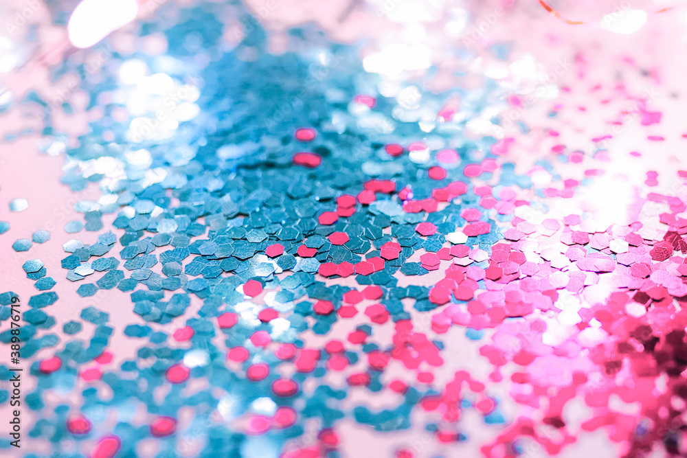 Pink and blue sparkles and lights on the pink background. Stock Photo ...