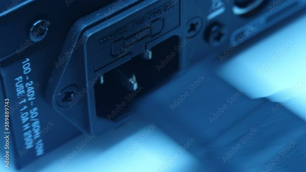 Insert and pull out electric cable of 110-220 volts on the rear panel ...