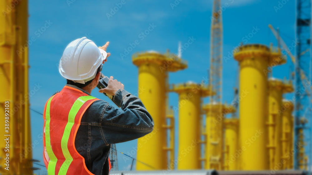 Worker in Construction site Engineer cast in helmets and protective ...