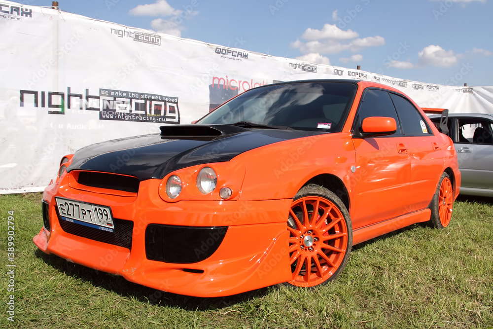 Moscow, Russia - May 25, 2019: A bright orange Subaru WRX STI tuned in ...
