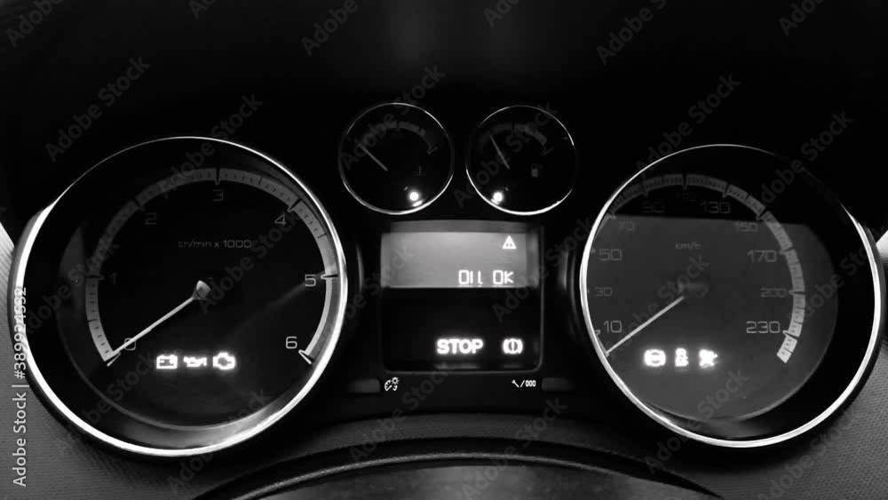 Handheld Shot Car Warning Light Symbols and Indicators on Car Dashboard ...