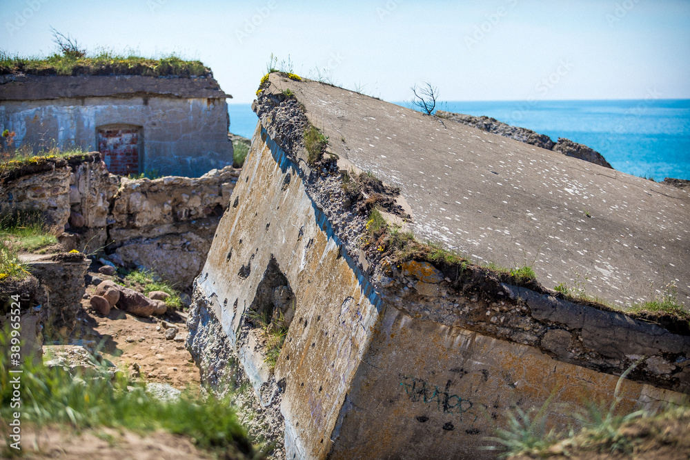 Liepaja beach bunker. Brick house, soft water, waves and rocks ... Liepaja beach bunker. Brick house, soft water, waves and rocks ...