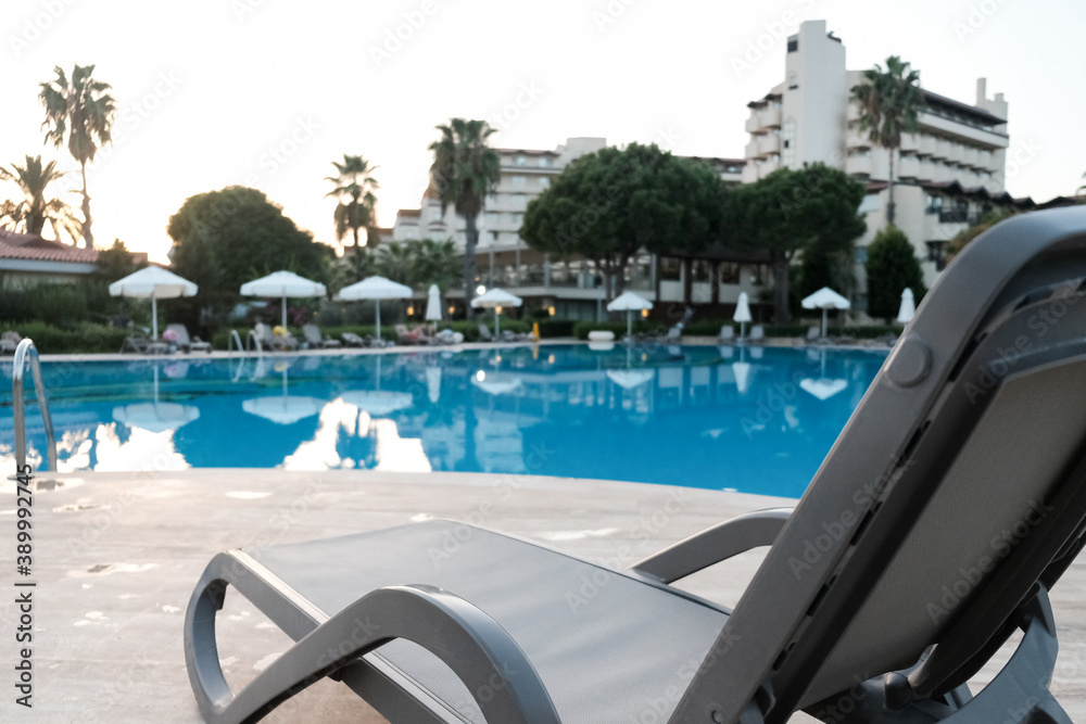 Luxury swimming pool at beautiful hotel. Tropical vacation or weekend ...
