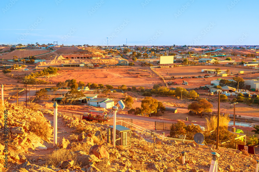 Sunset aerial view of Coober Pedy underground town in Australia from ...