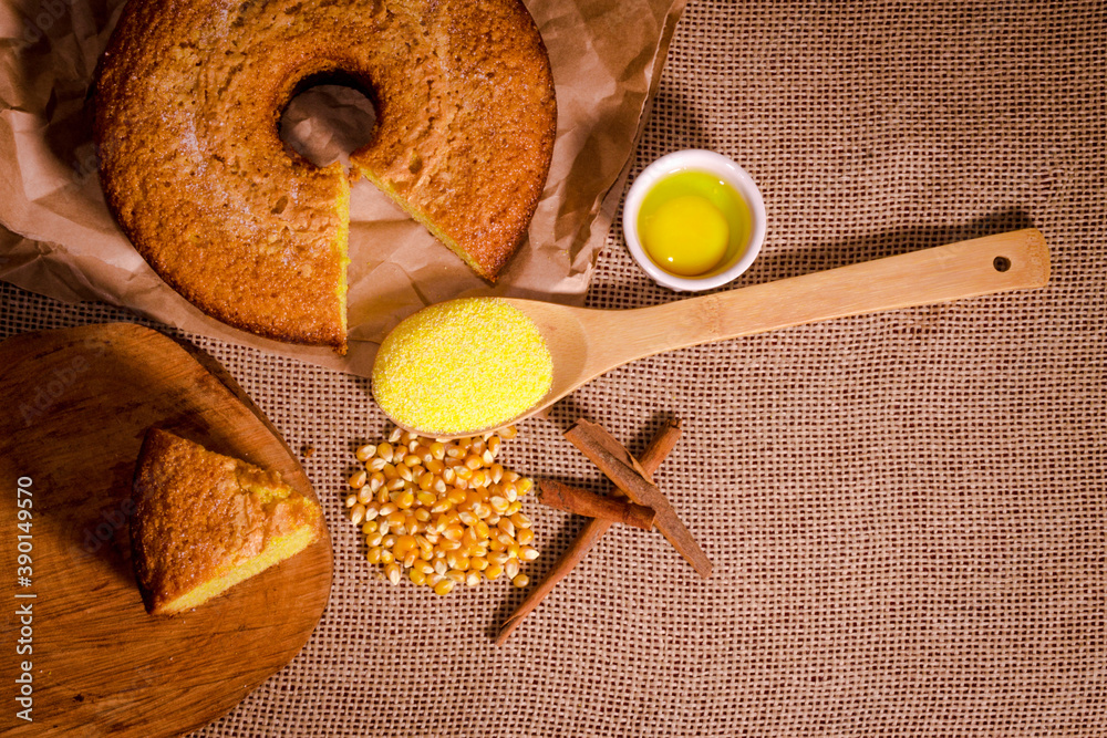 Brazilian corn cake made with a type of corn flour (Fuba) on the wood ...