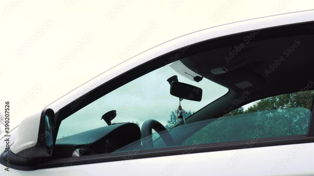 Opens window of car. Side car driver's window Opens. Automatic ...