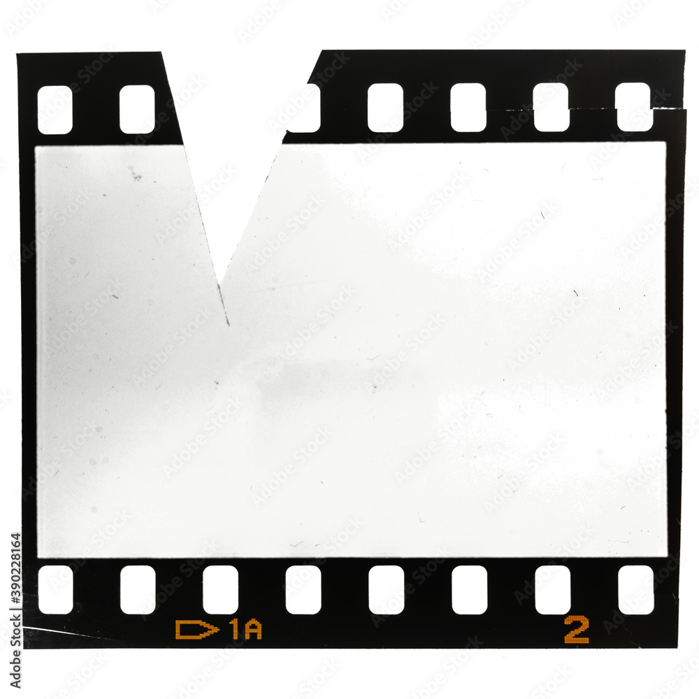 35mm film strip or frame on white with cut out missing piece on the top ...