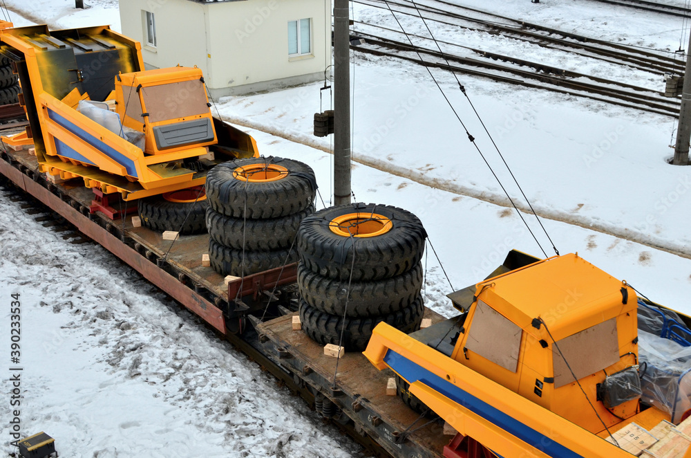 Yellow mining truck disassembled into parts, cab, body, electric motor ...