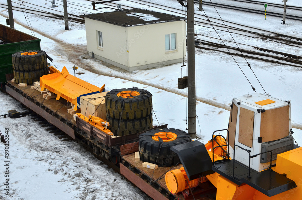 Yellow mining truck disassembled into parts, cab, body, electric motor ...