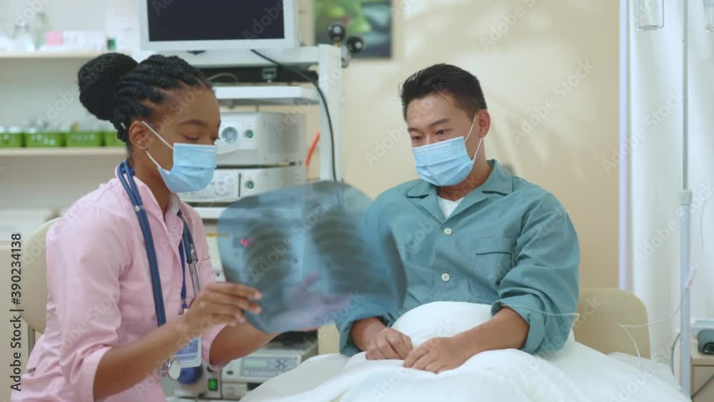 Quarrel at hospital. African american woman doctor consulting male ...