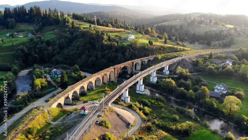 Historic arch bridge in Vorokhta, Ukraine. Railway viaduct old bridge ...