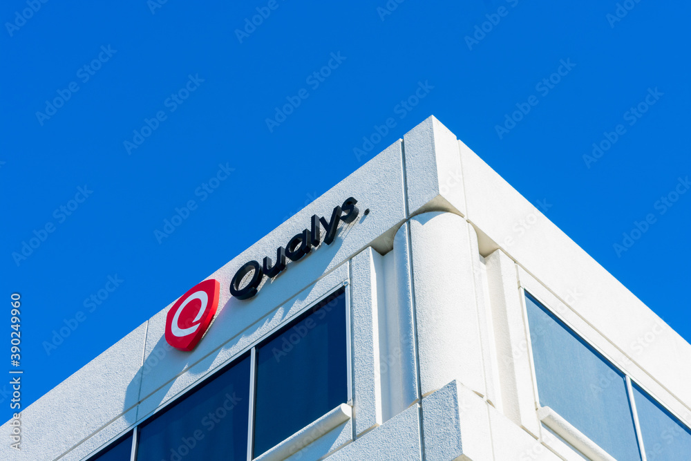 Qualys logo and sign on cloud security, compliance and related services ...