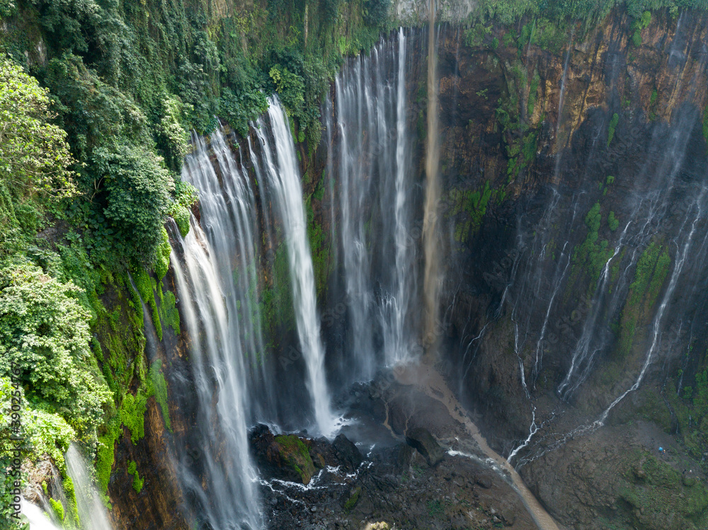 Stunning view of the Tumpak Sewu Waterfalls also known as Coban Sewu ...