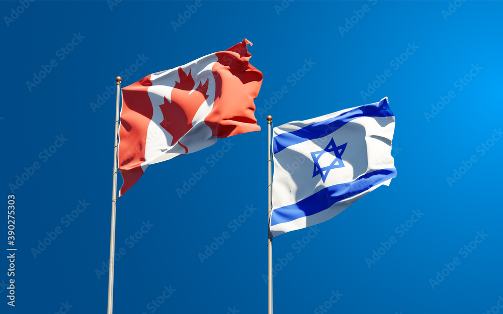 Beautiful national state flags of Israel and Canada together at the sky ...