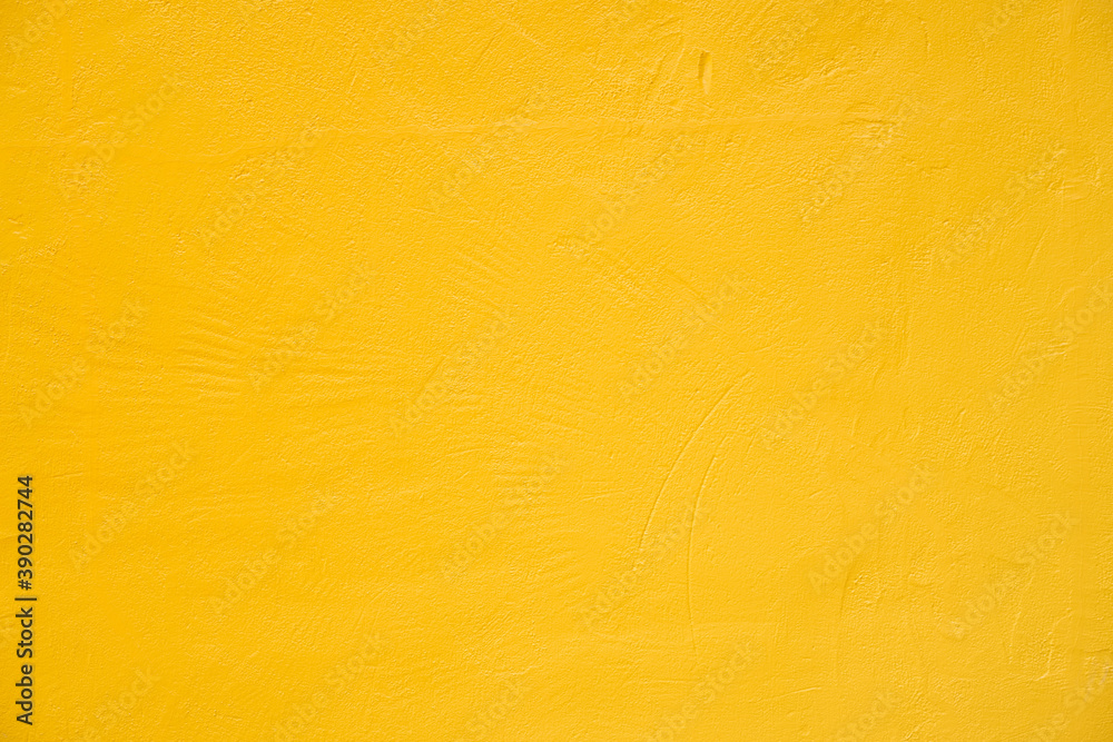 Yellow concrete texture details background. Paint brickwork wall and ...