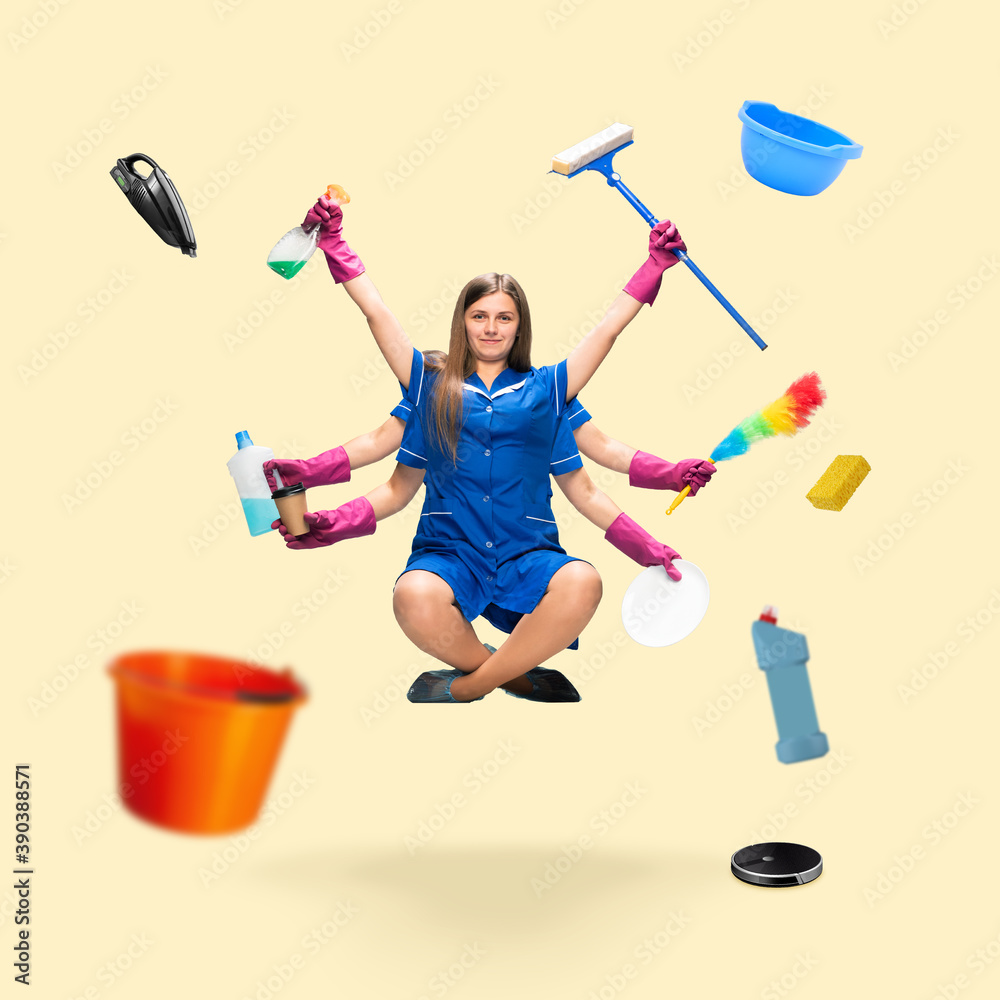 Handsome maid, multi-armed housemaid levitating isolated on yellow ...
